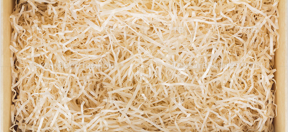 Box with decorative straw