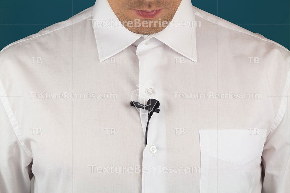 White man's shirt with lavalier microphone for interview