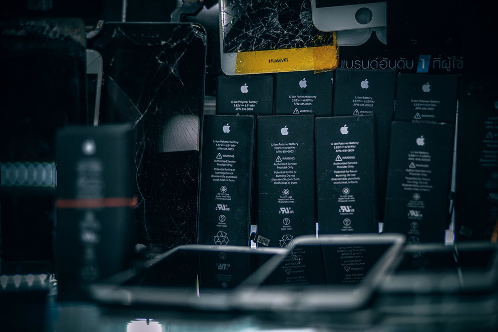 Packaged Apple Batteries Stacked in a Shop (6000 x 4000px)