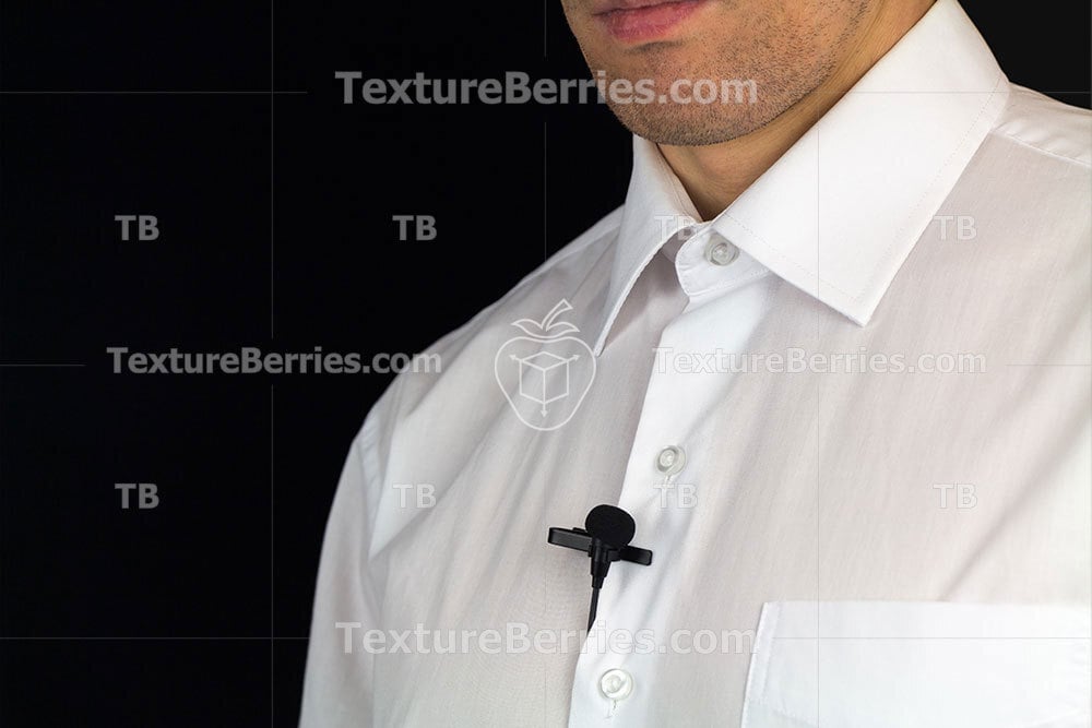 White man's shirt with lavalier microphone, preparation for interview
