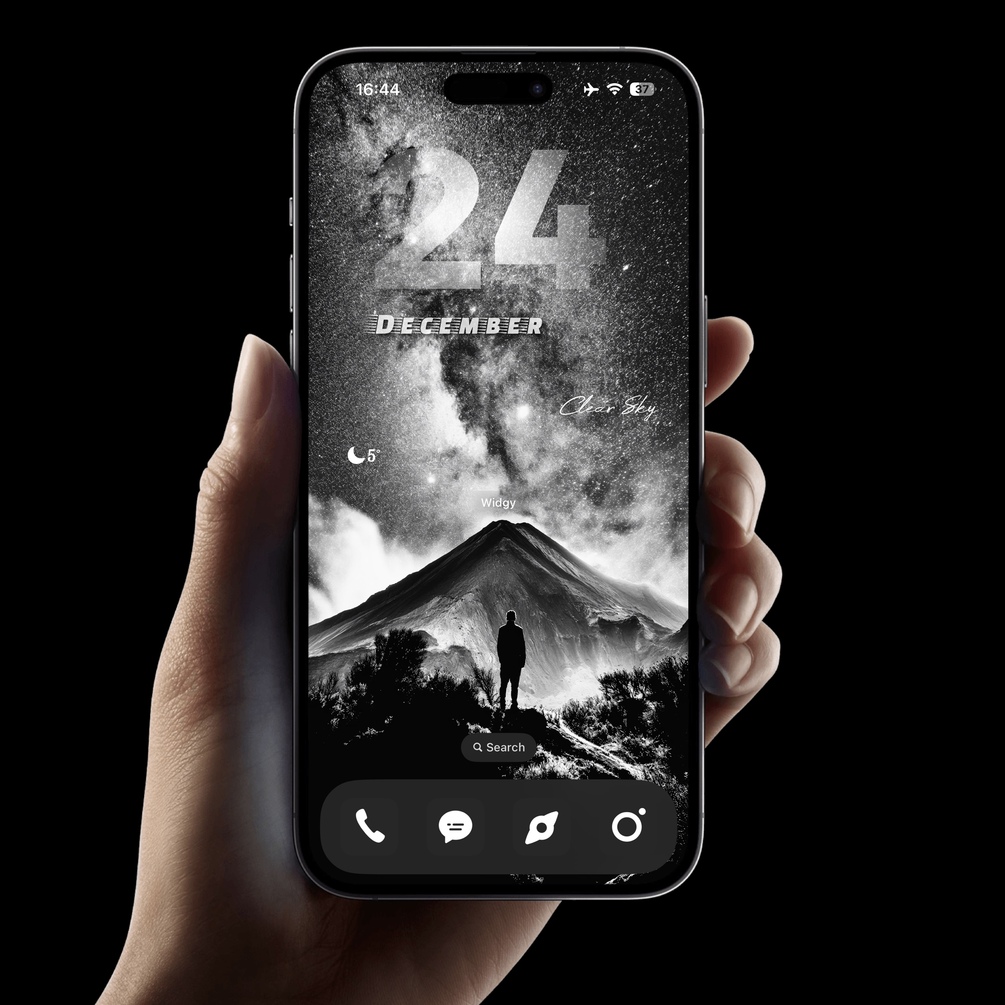 A person looking up at the dark night starry sky theme wallpaper widge