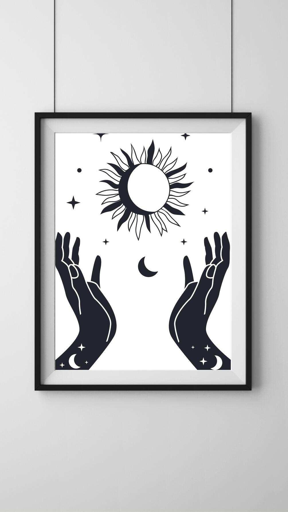black hand holding sun and moon