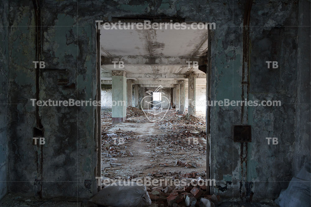 Inside destroyed building, long corridor