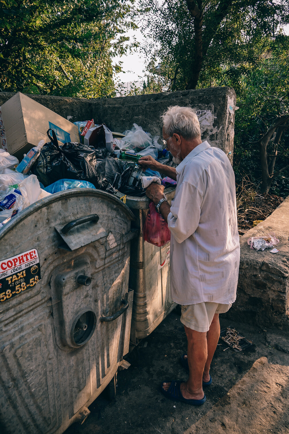 Man Looking Through Trash Containers (3691 x 5537px)