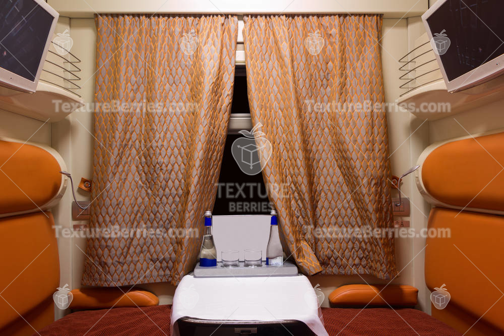 Railroad train modern interior at night, first class