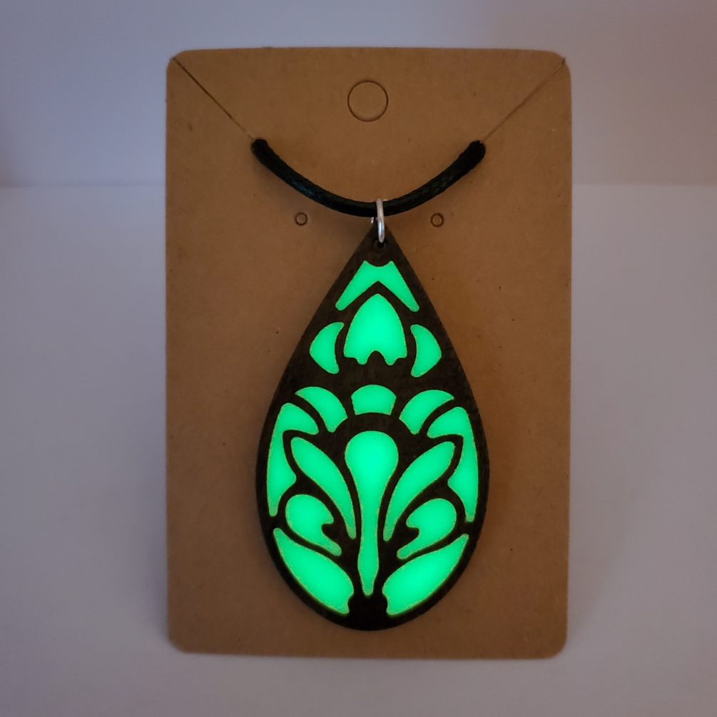 Filigree glow in the dark wooden necklace
