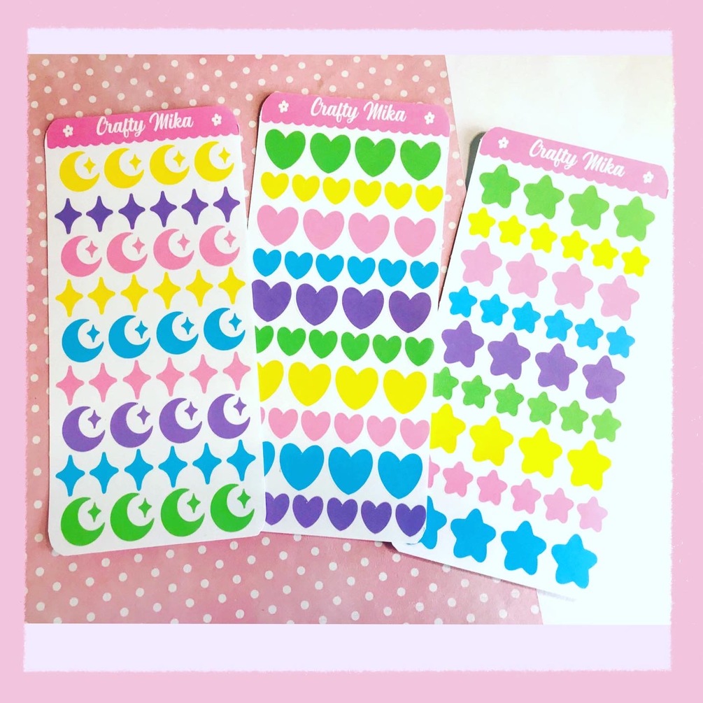 Heart, stars and moons stickers sheet on pastel colors