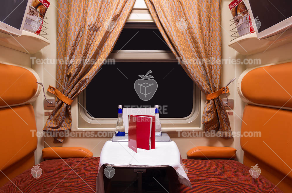 Railroad train luxury interior at night, black window