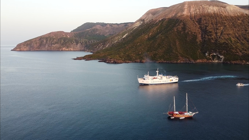 The best wallpaper you have ever seen, vulcano with sea and ships in front